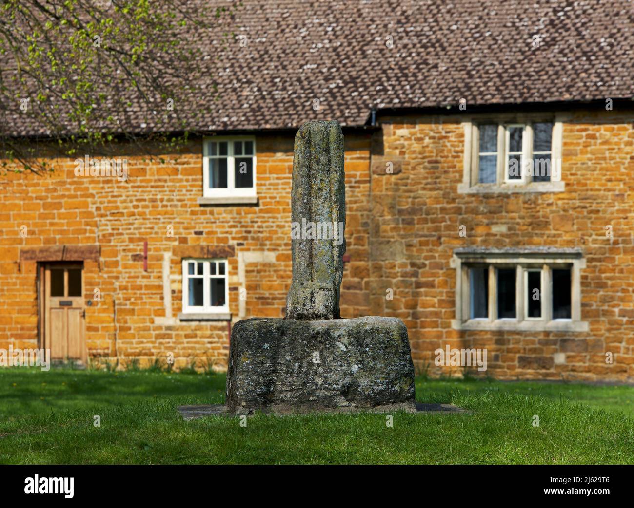 The old market cross in the village of Lyddington, Rutland, England UK ...