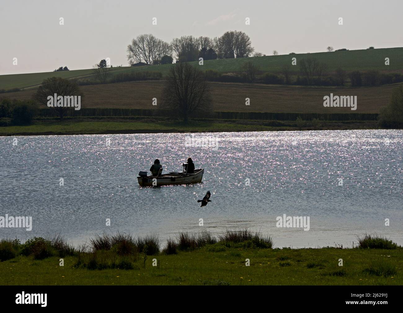 Fishing from dinghy on Eye Brook Reservoir in Leicestershire (and ...