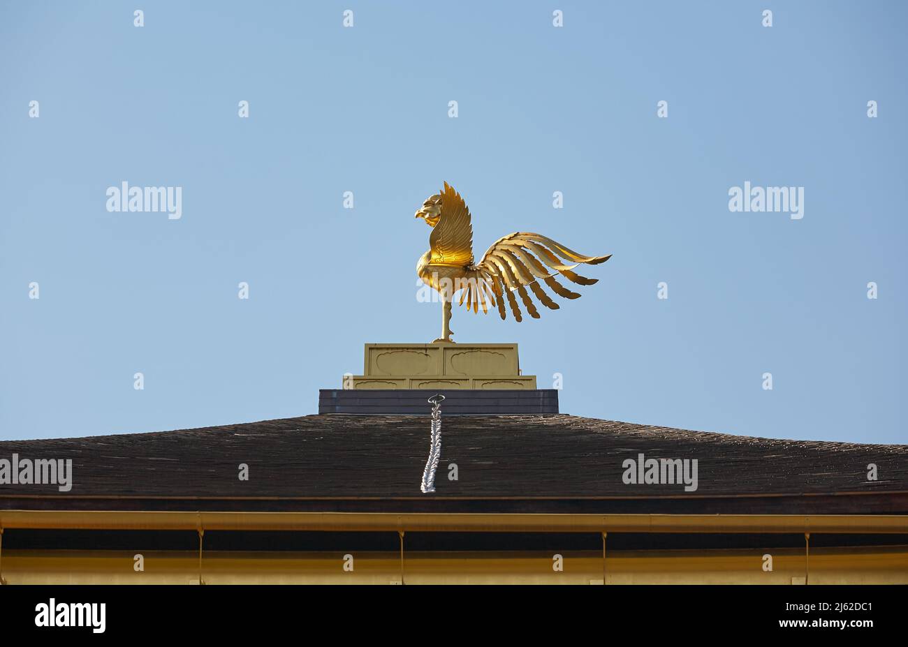 The bronze ornament of mythological bird phoenix (hoo or Fenghuang) on ...