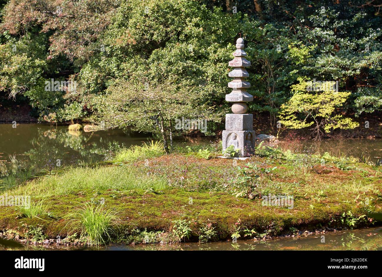 The stone White Snake Pagoda (Hakuja-zuka) on the islet in the Anmin ...