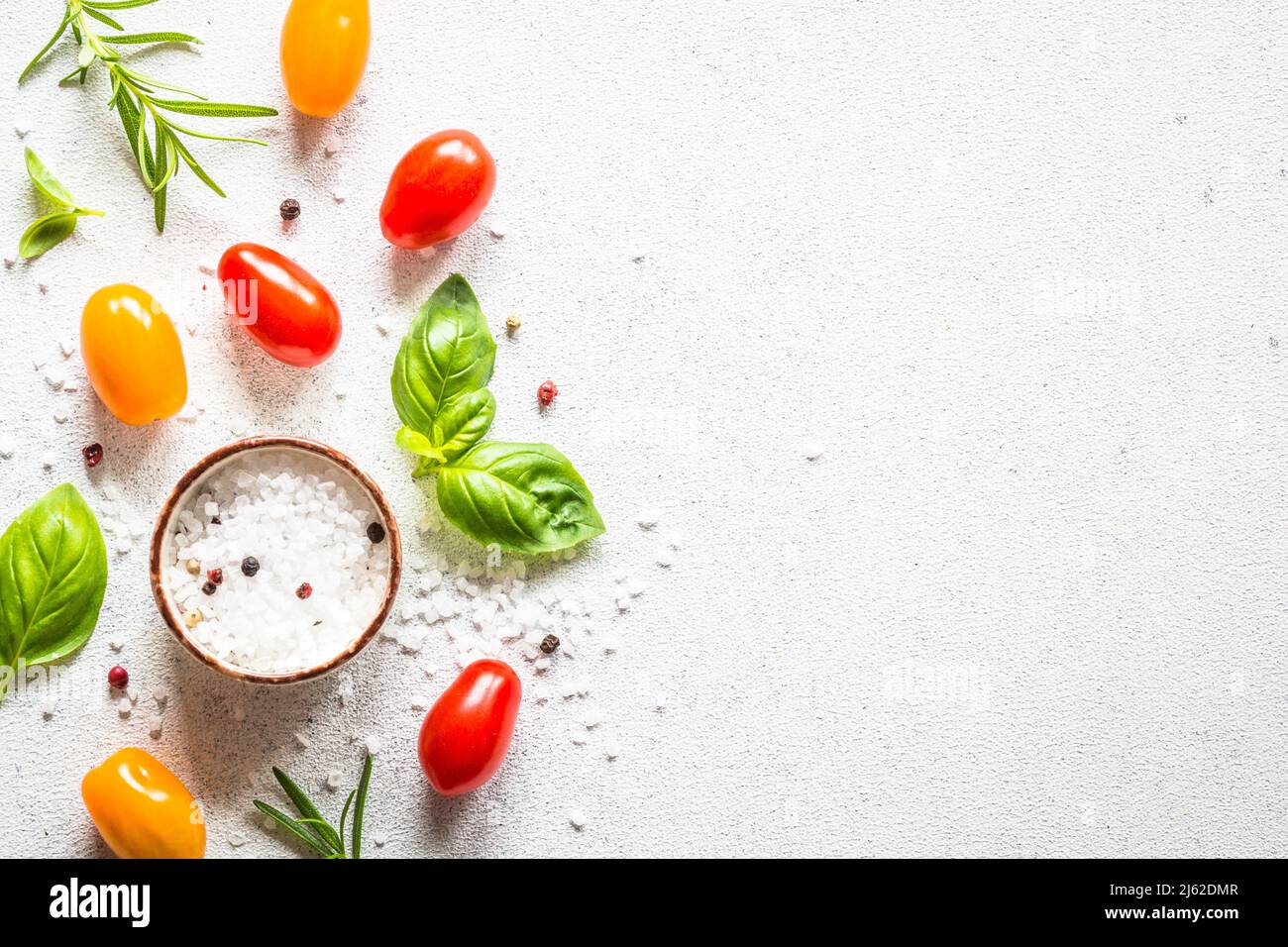 Food cooking background on white stone table Stock Photo - Alamy