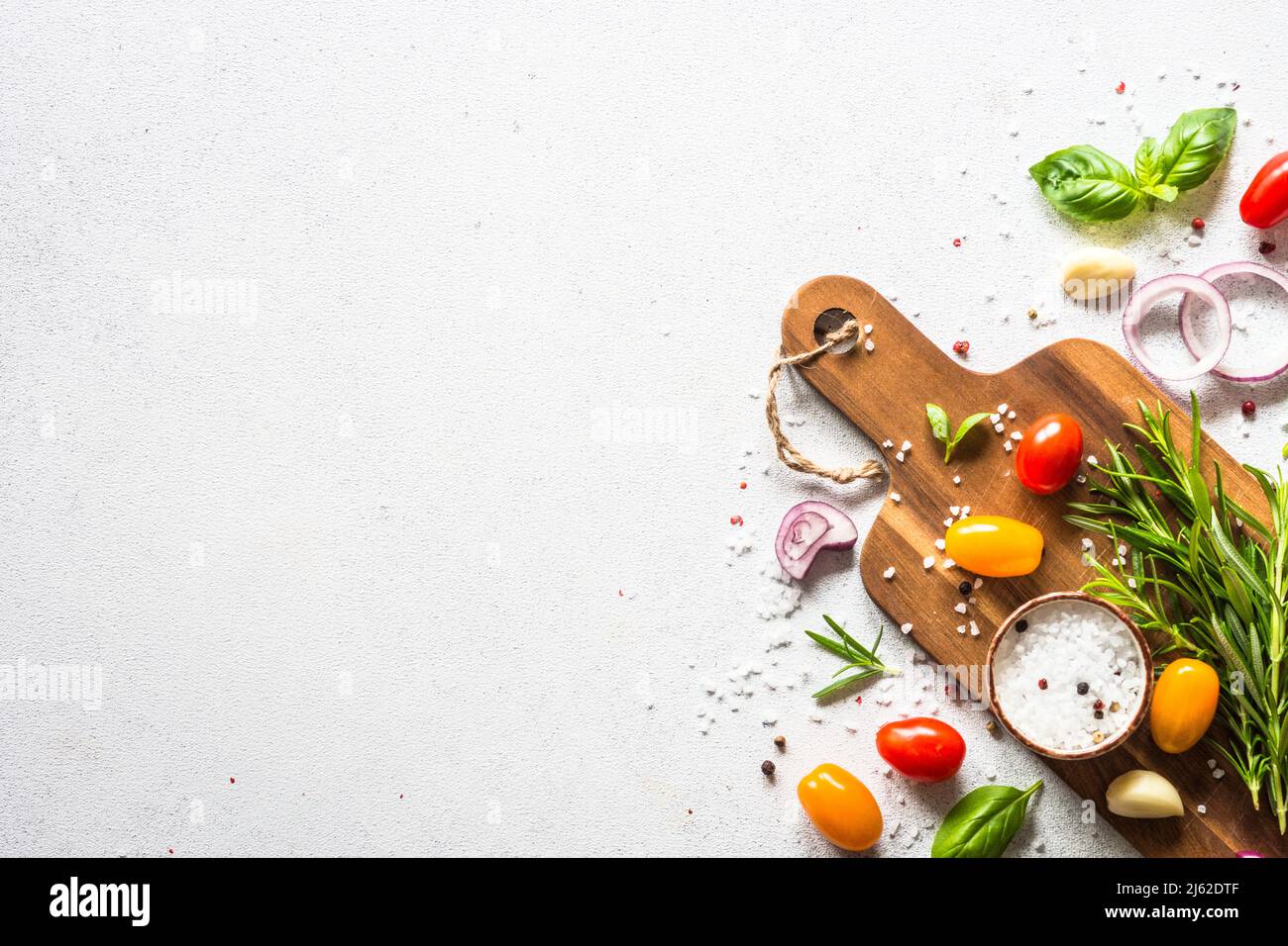 Food cooking background on white stone table Stock Photo - Alamy