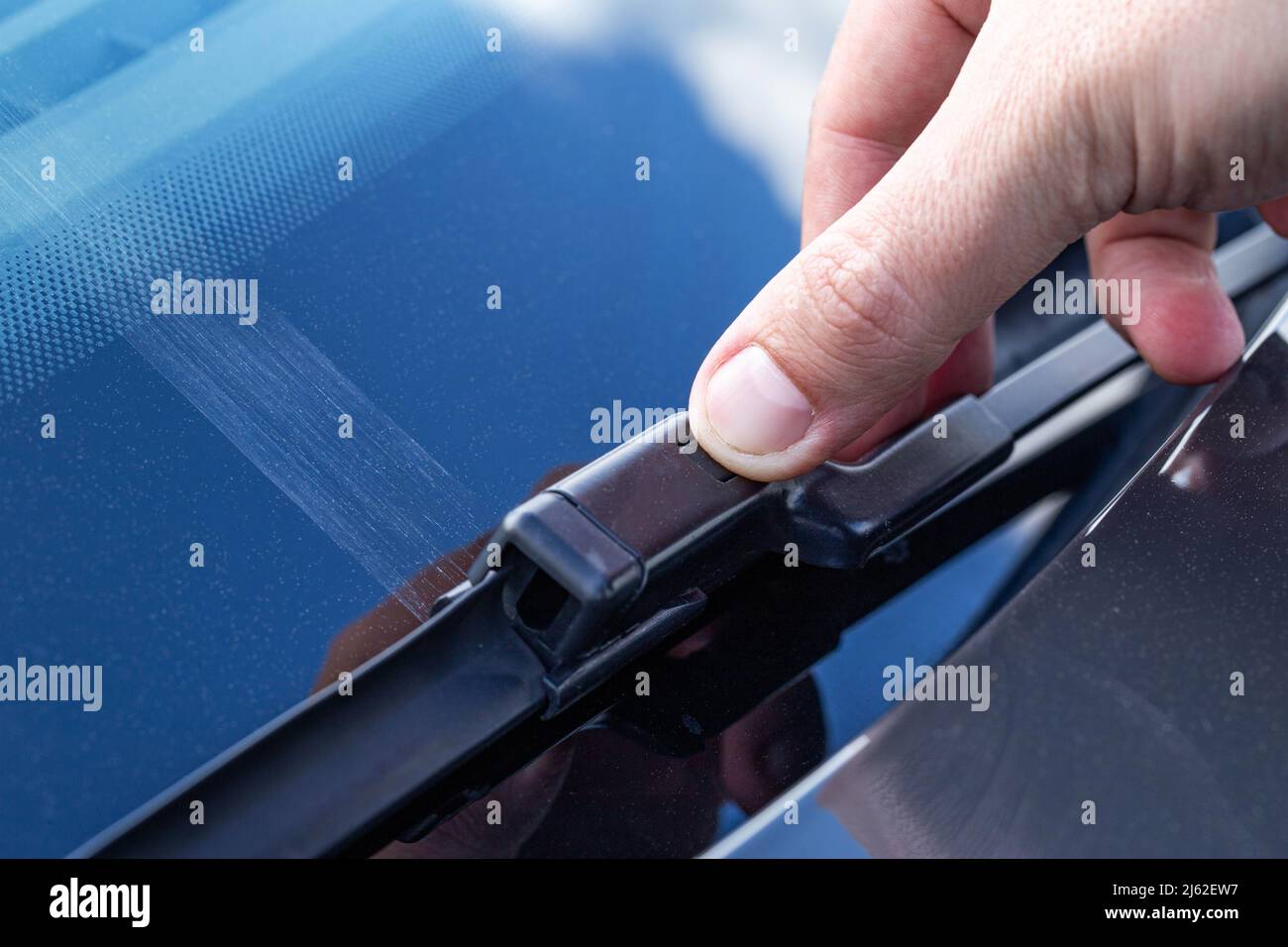 Replacing a car windshield wiper wiper with graphic coating wipers ...