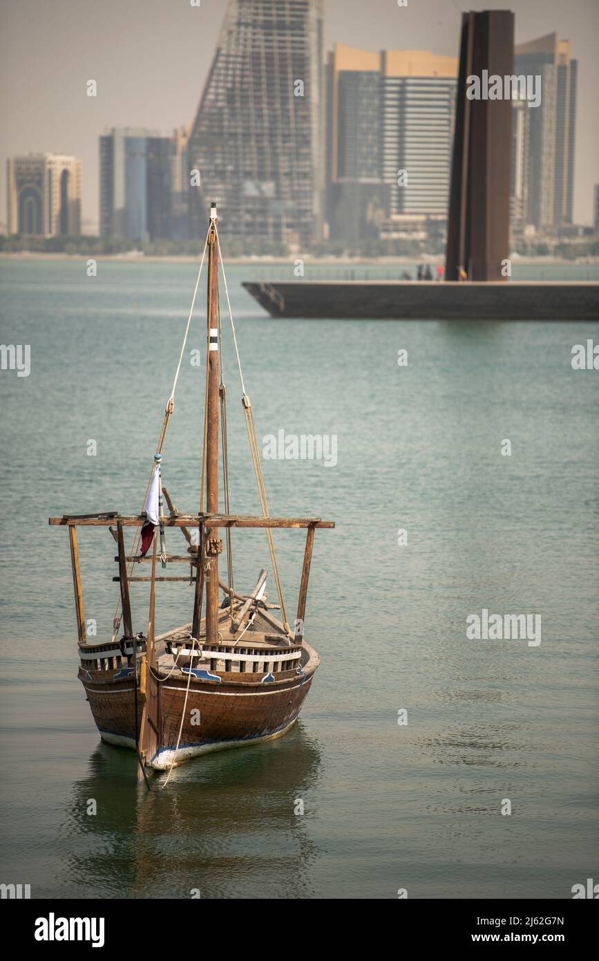 Doha,Qatar- April 24,2022 : Traditional dhow boats with the futuristic ...