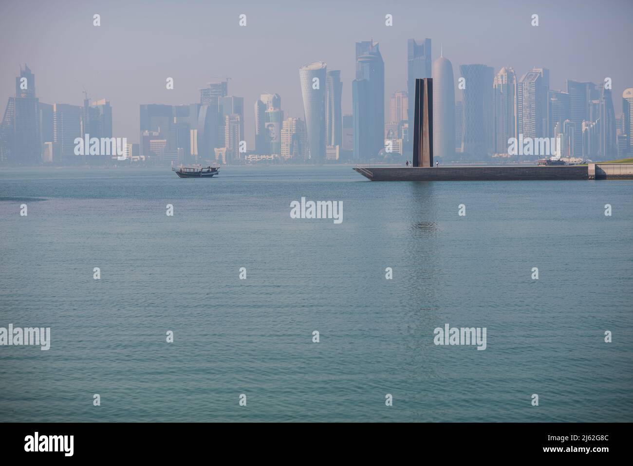 Doha,Qatar- April 24,2022 : Traditional dhow boats with the futuristic ...
