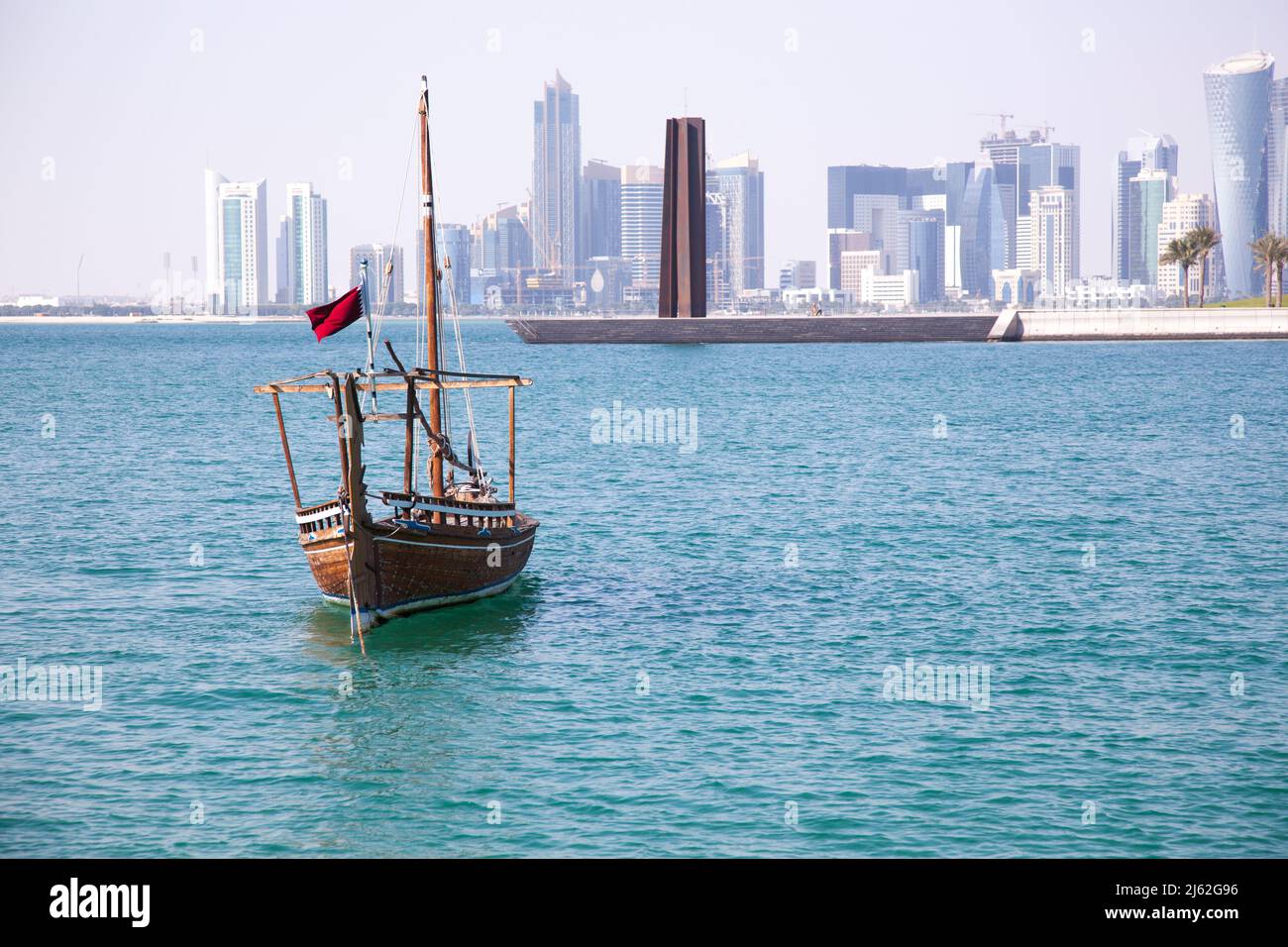 Doha,Qatar- April 24,2022 : Traditional dhow boats with the futuristic ...