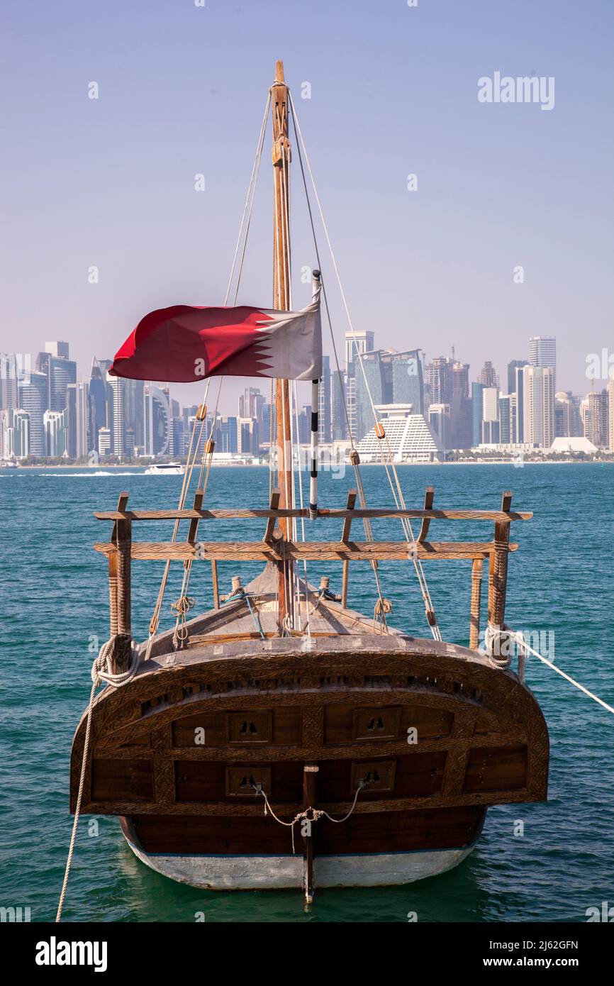 Doha,Qatar- April 24,2022 : Traditional dhow boats with the futuristic ...