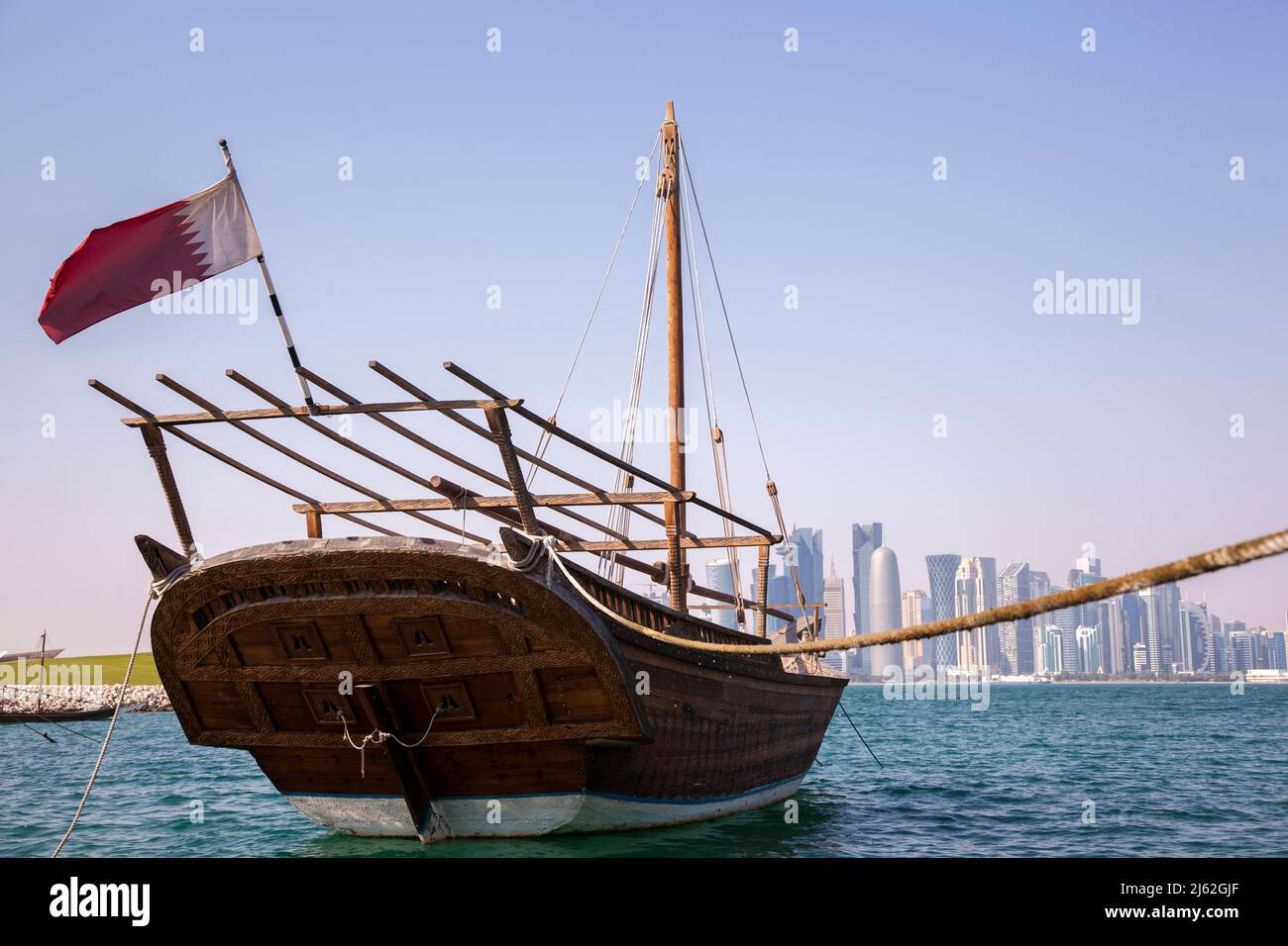 Doha,Qatar- April 24,2022 : Traditional dhow boats with the futuristic ...