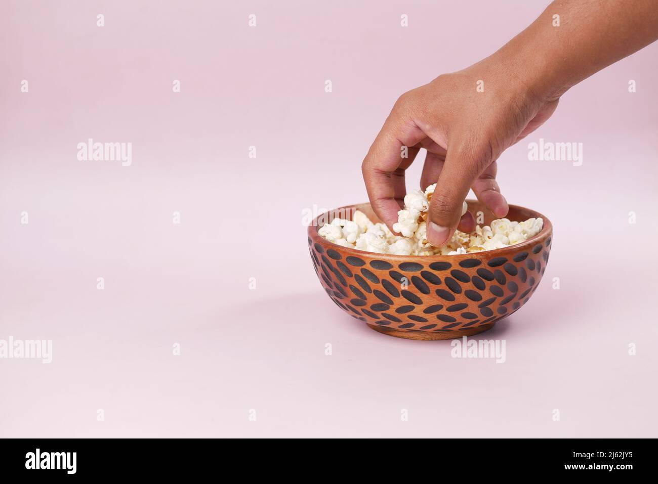 Picking popcorn hi-res stock photography and images - Alamy