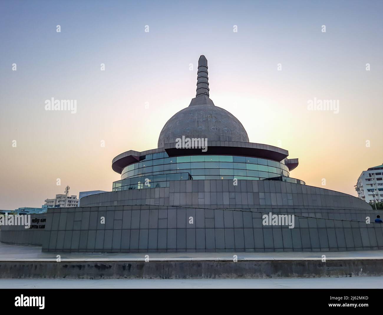 buddha stupa with bright colorful evening sky at dusk from different ...