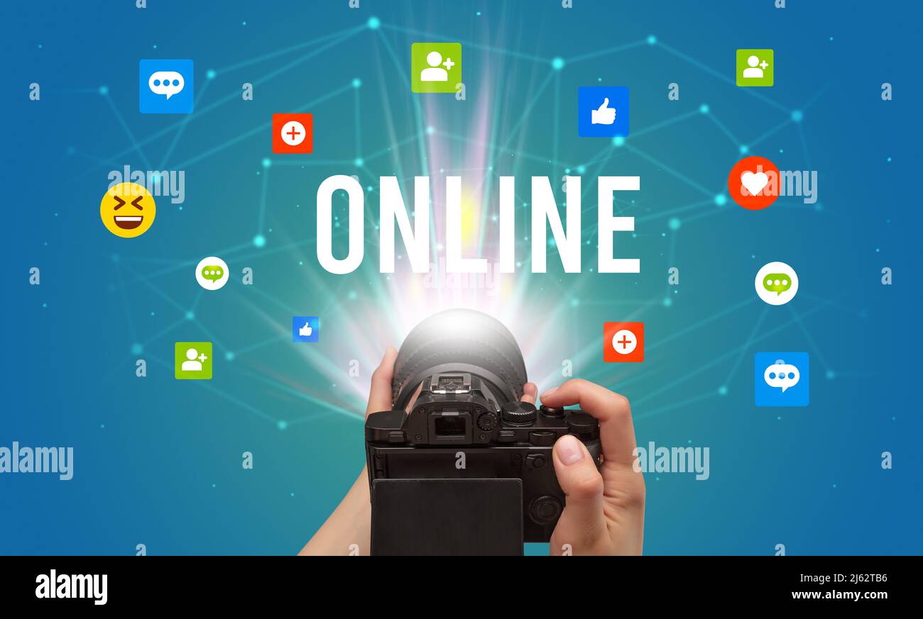 Using camera to capture social media content Stock Photo - Alamy