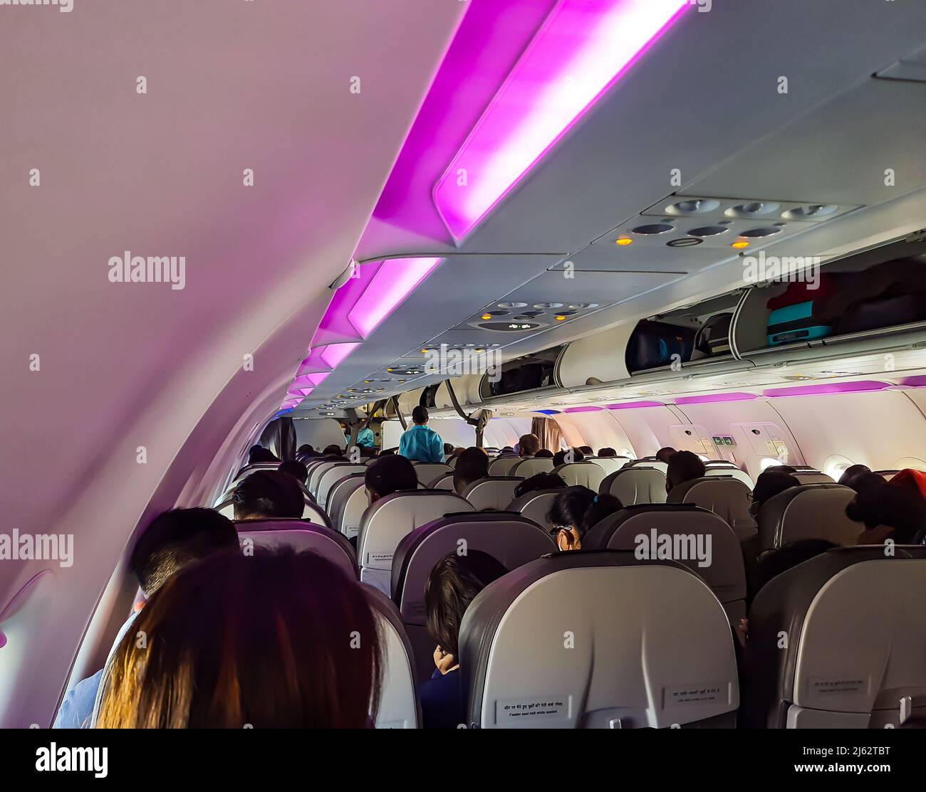 flight inside view with passenger settled at seat from top angle image ...