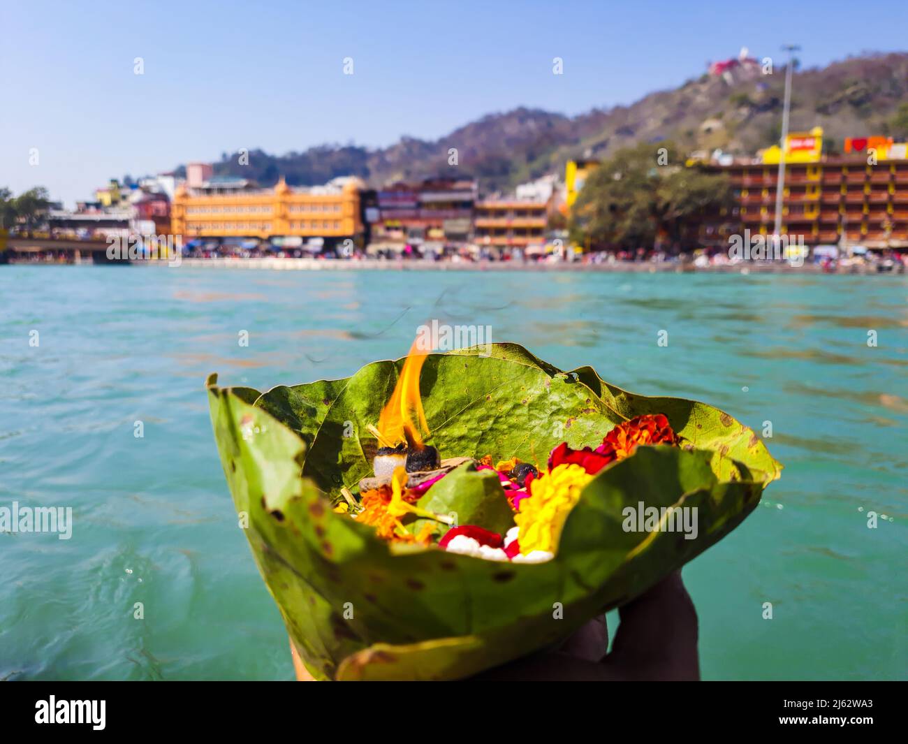 devotee offerings flowers to holy river at morning from top angle image ...