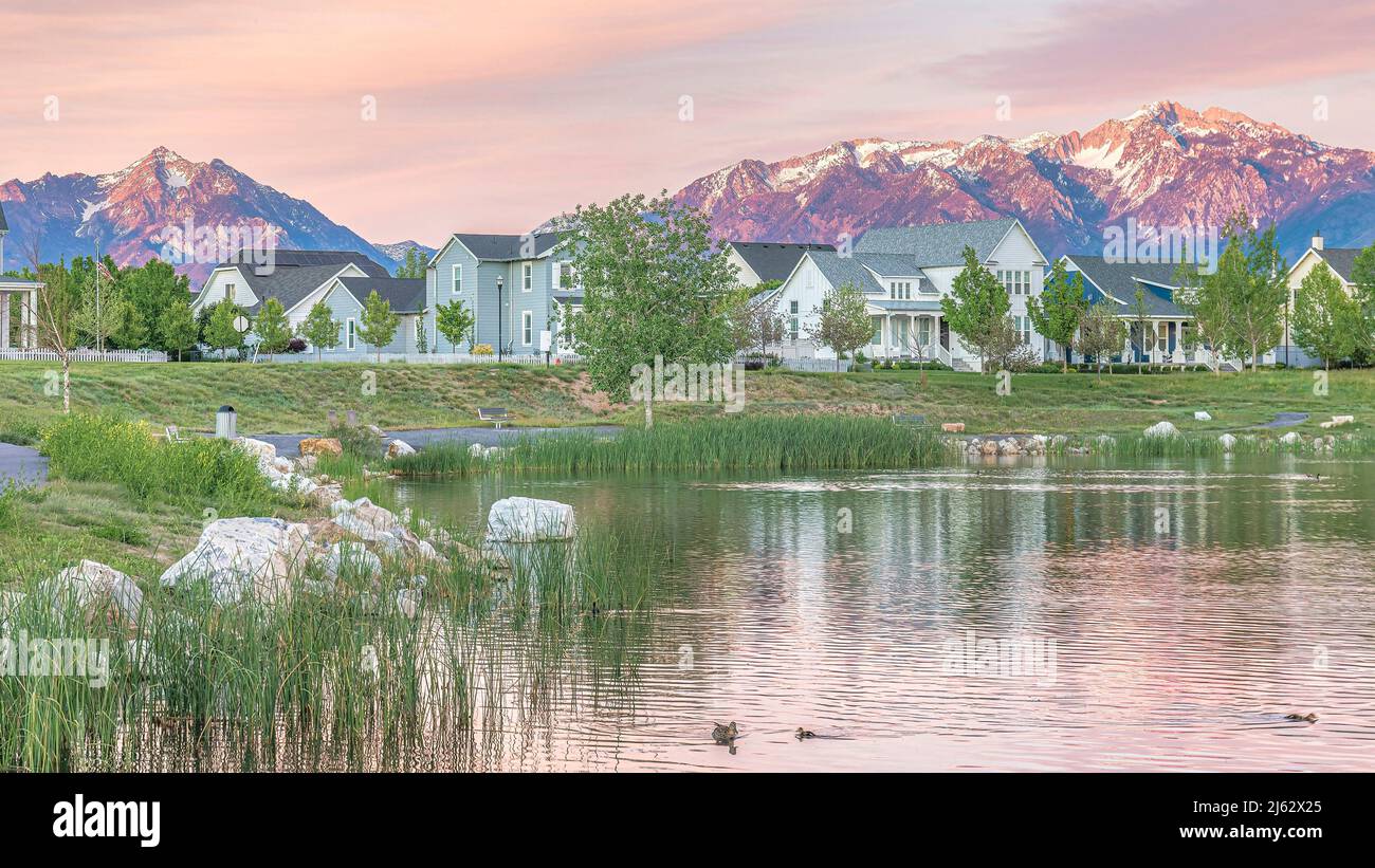 Panorama Oquirrh Lake with a reflection of the pink and orange hue ...