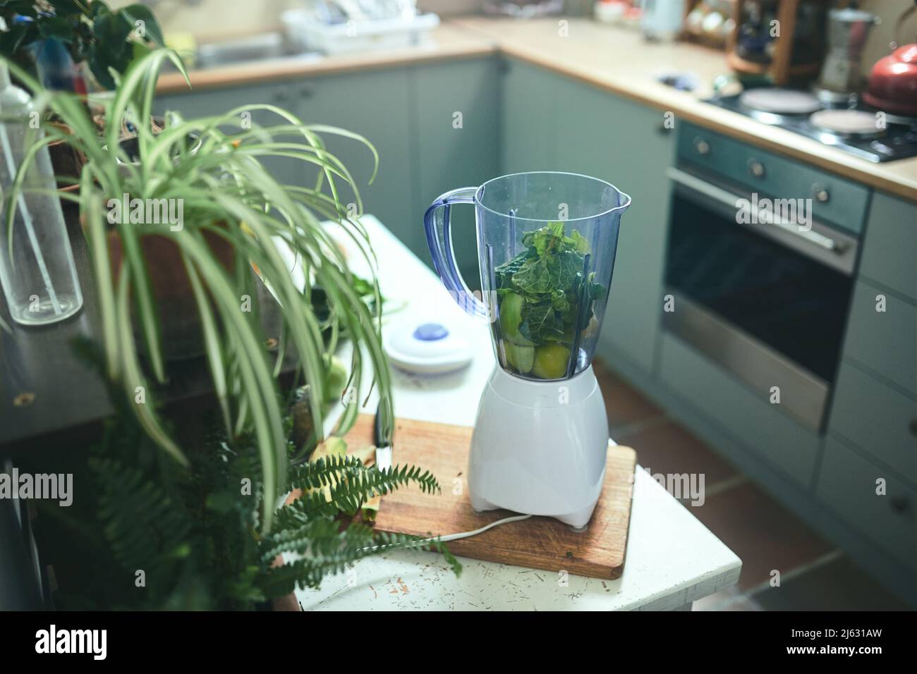 Fresh greens lettuce in kitchen hi-res stock photography and images - Alamy