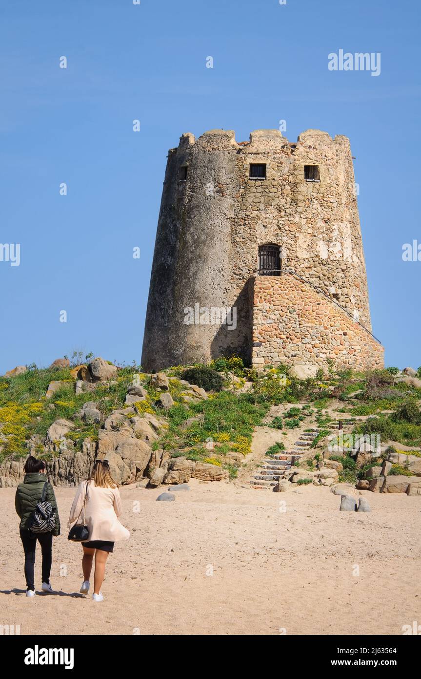 The blossoming Italian island of Sardinia. Torre watchtower on the sea ...