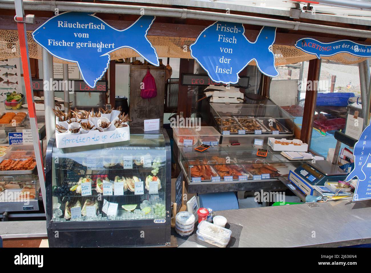 Fish sandwiches and fresh fishes of fishing trawler "Heimat", harbour ...