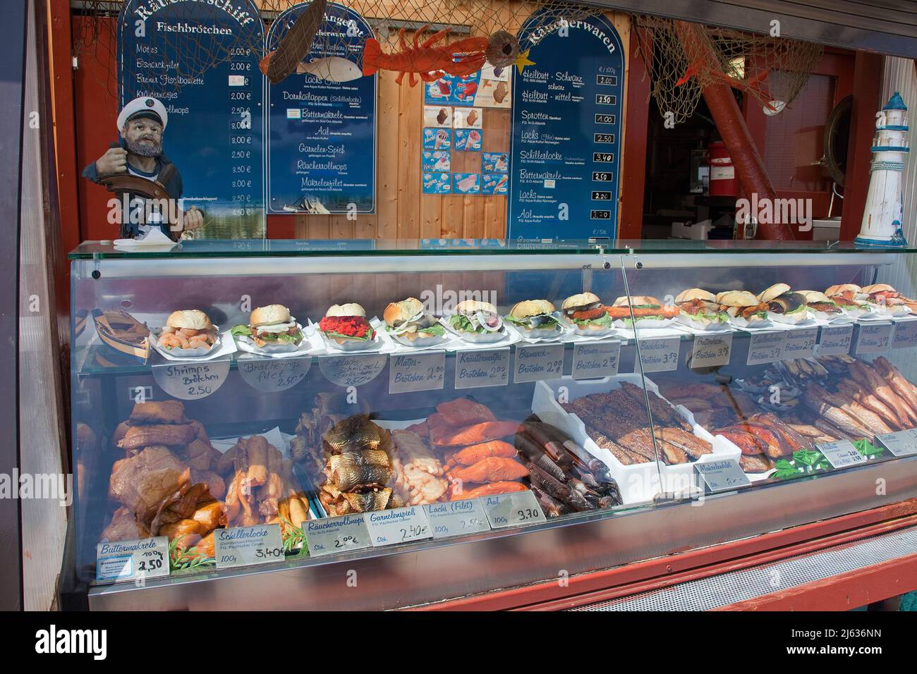 Fish sandwiches and fresh fishes of fishing trawler "Heimat", harbour ...