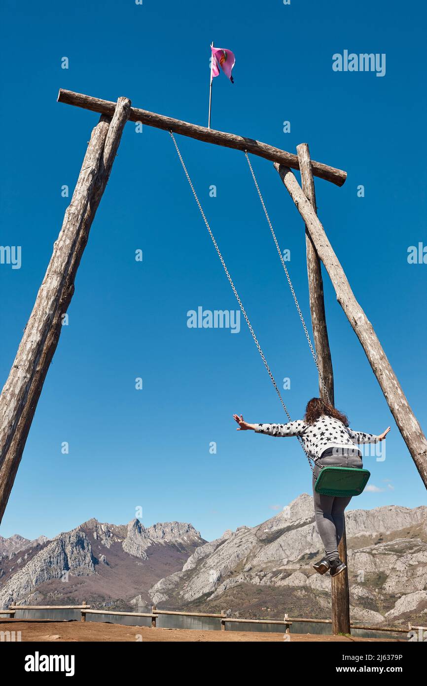Huge swing surrounded by mountains in Riano village. Spain Stock Photo ...