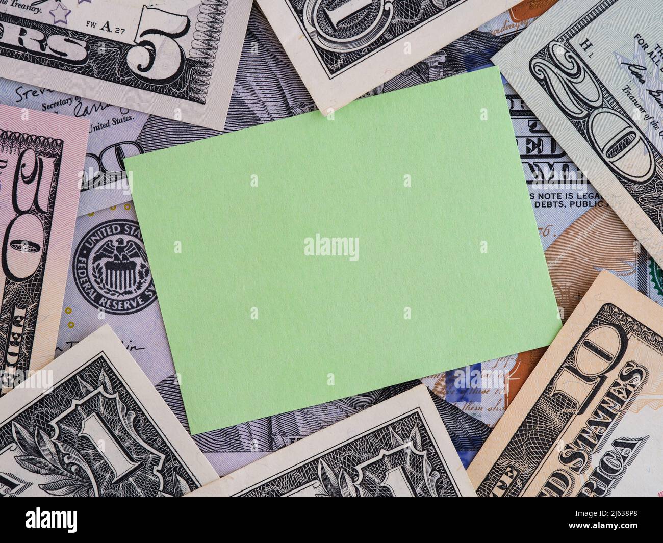 A Green paper note on a United States Dollar bills background Stock ...