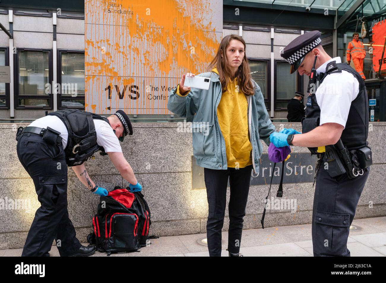 London, UK. 27 April 2022. Protestor from Axe Drax spray paint to the ...