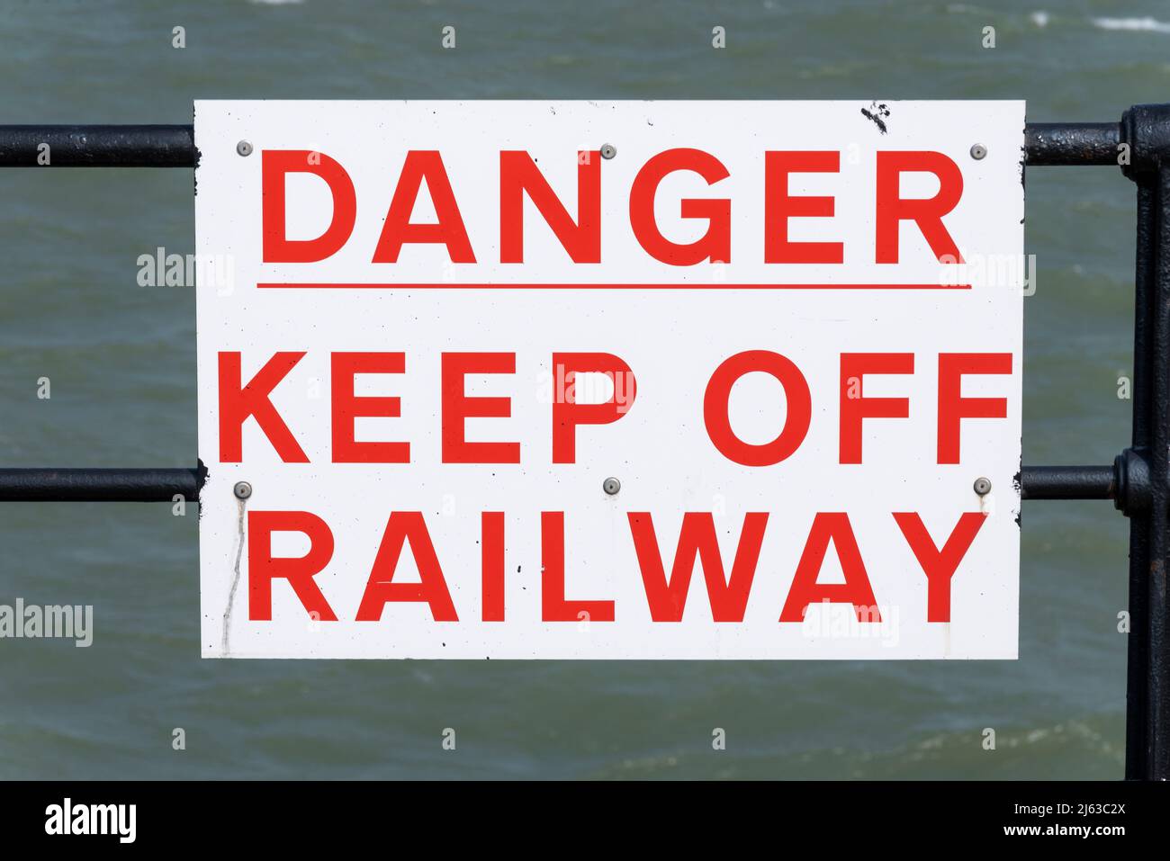 Danger keep off railway, warning sign, on Southend Pier. Water Stock ...