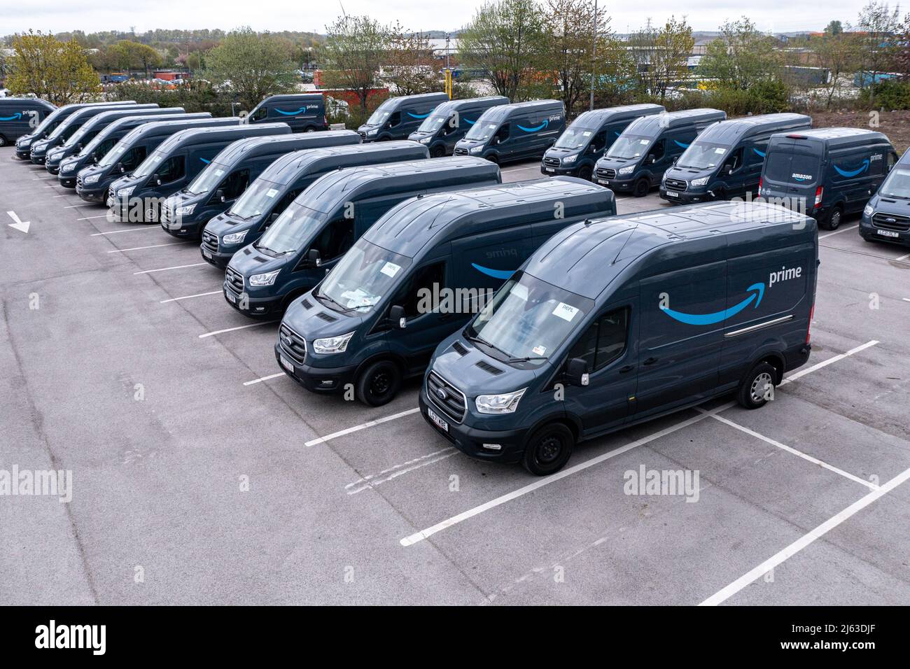 LEEDS, UK - APRIL 25, 2022. A fleet of Amazon Prime Ford Transit ...