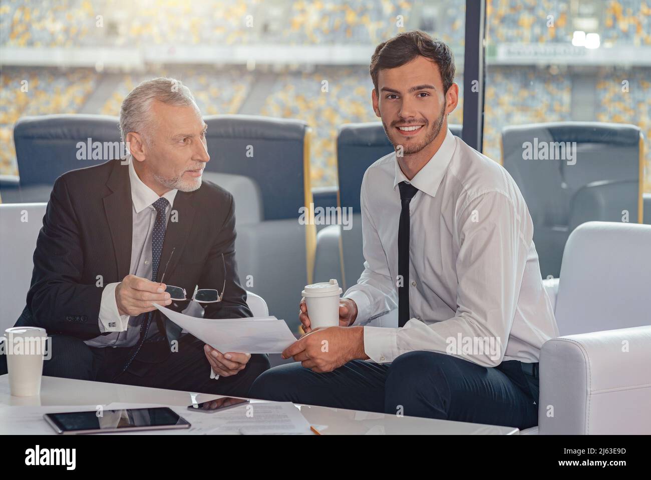 Reviewing two businessmen in hi-res stock photography and images - Alamy
