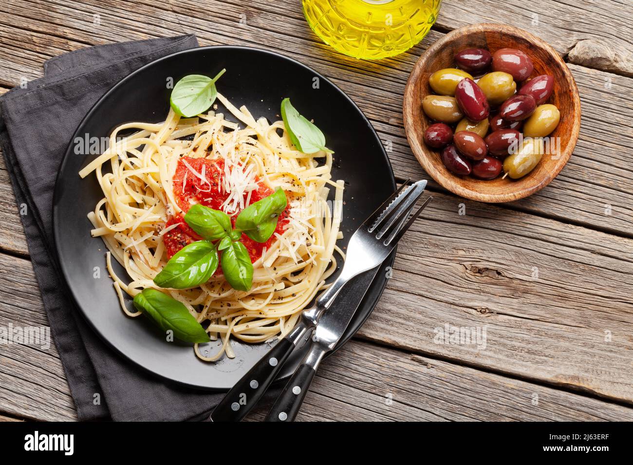 Pasta with tomato sauce and basil. Top view flat lay with copy space ...