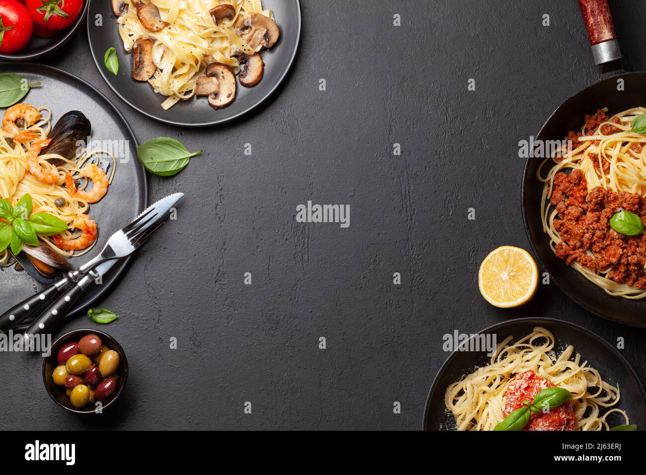 Various Italian pasta. Seafood, mushroom and tomato sauce pasta ...