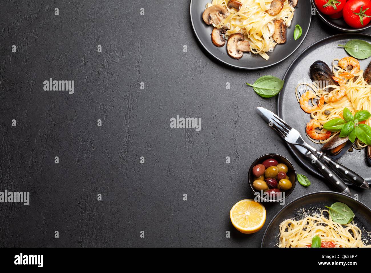 Various Italian pasta. Seafood, mushroom and tomato sauce pasta ...