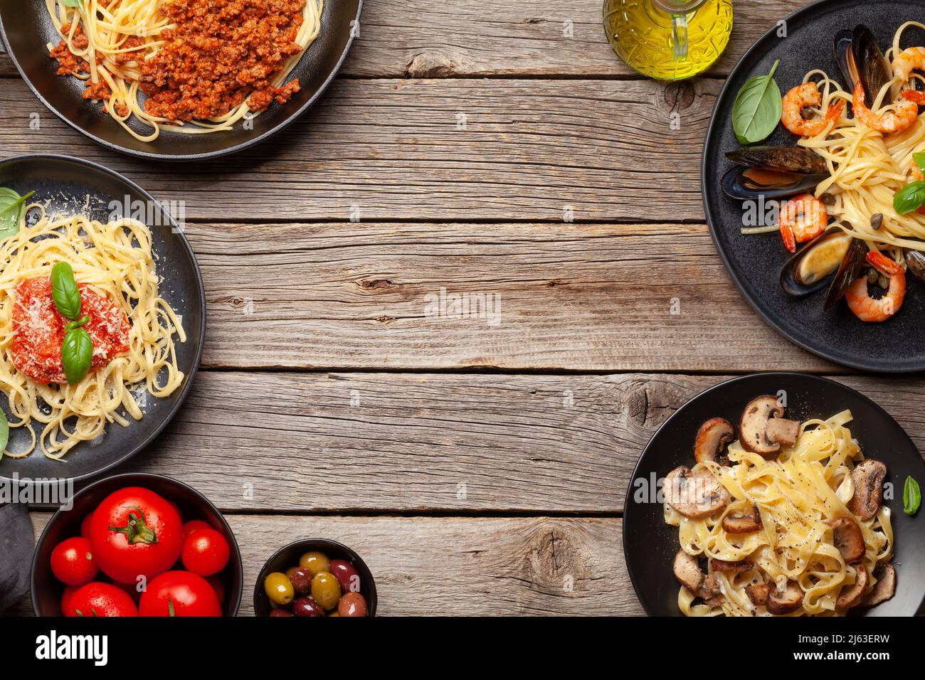 Various Italian pasta. Seafood, mushroom and tomato sauce pasta ...