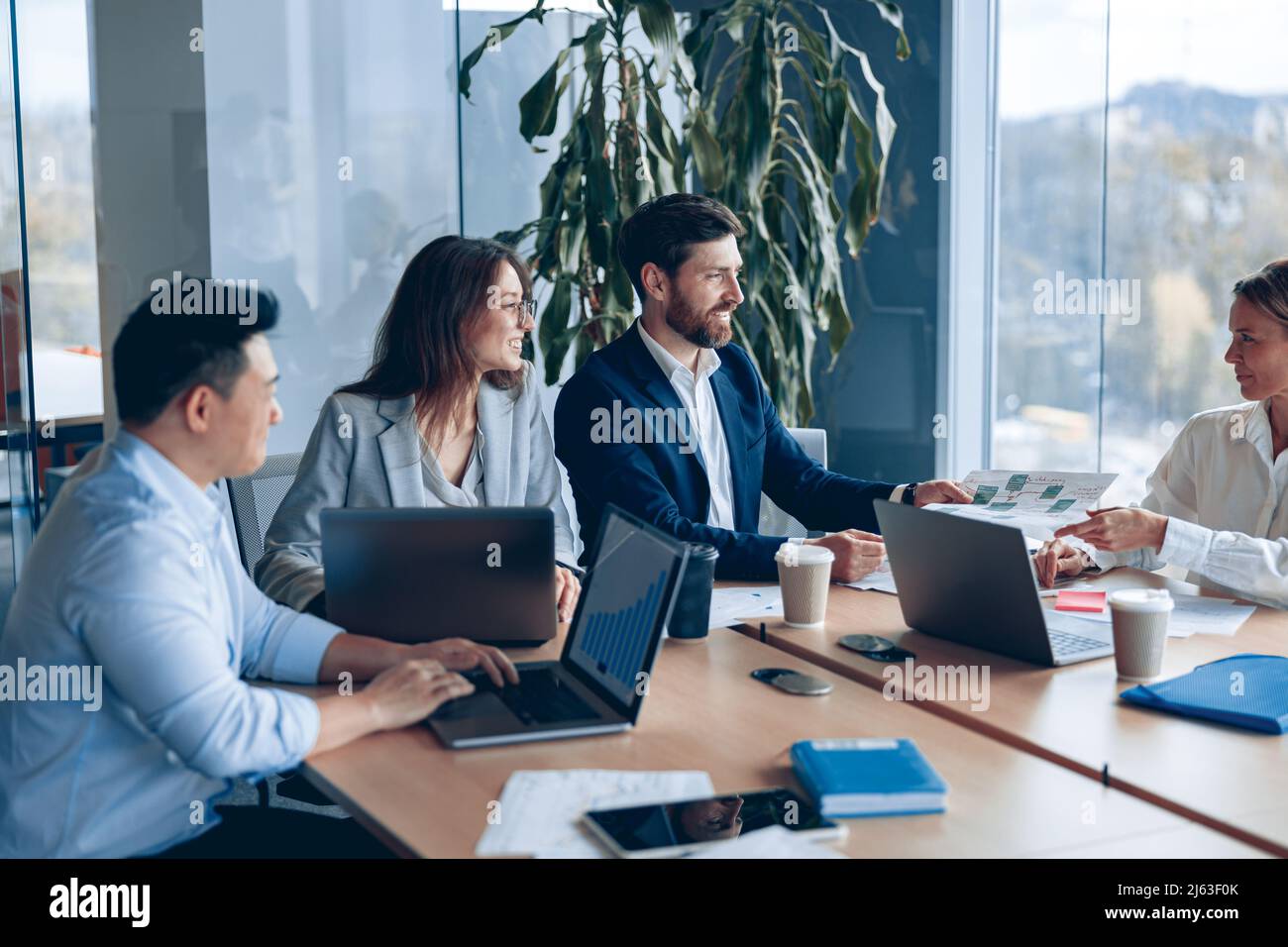 Corporate business team and manager in a meeting room at modern office ...