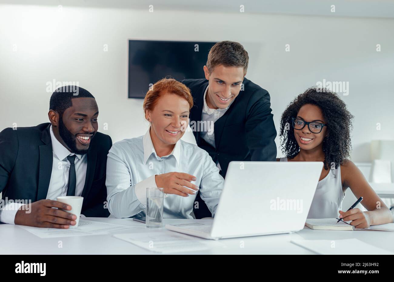 Creative team working on project at office Stock Photo - Alamy