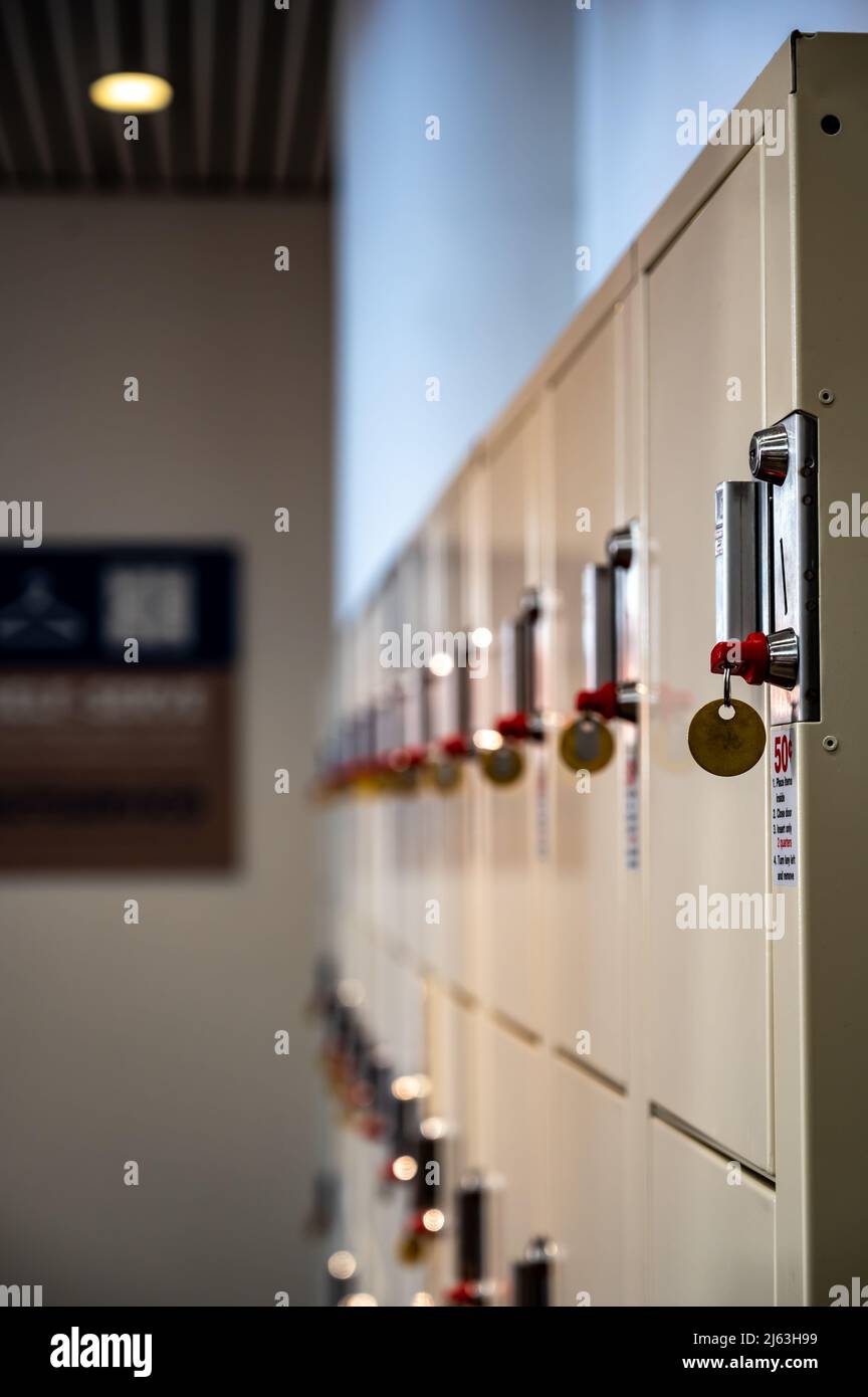 Rows of lockers for self-service storage of items at a public location ...