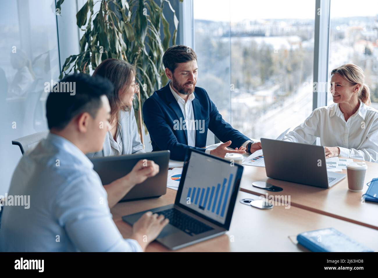 Creative business team working on project in modern office with ...