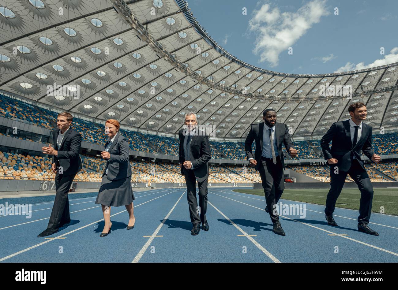 Group of business people participate in competition on race track Stock ...