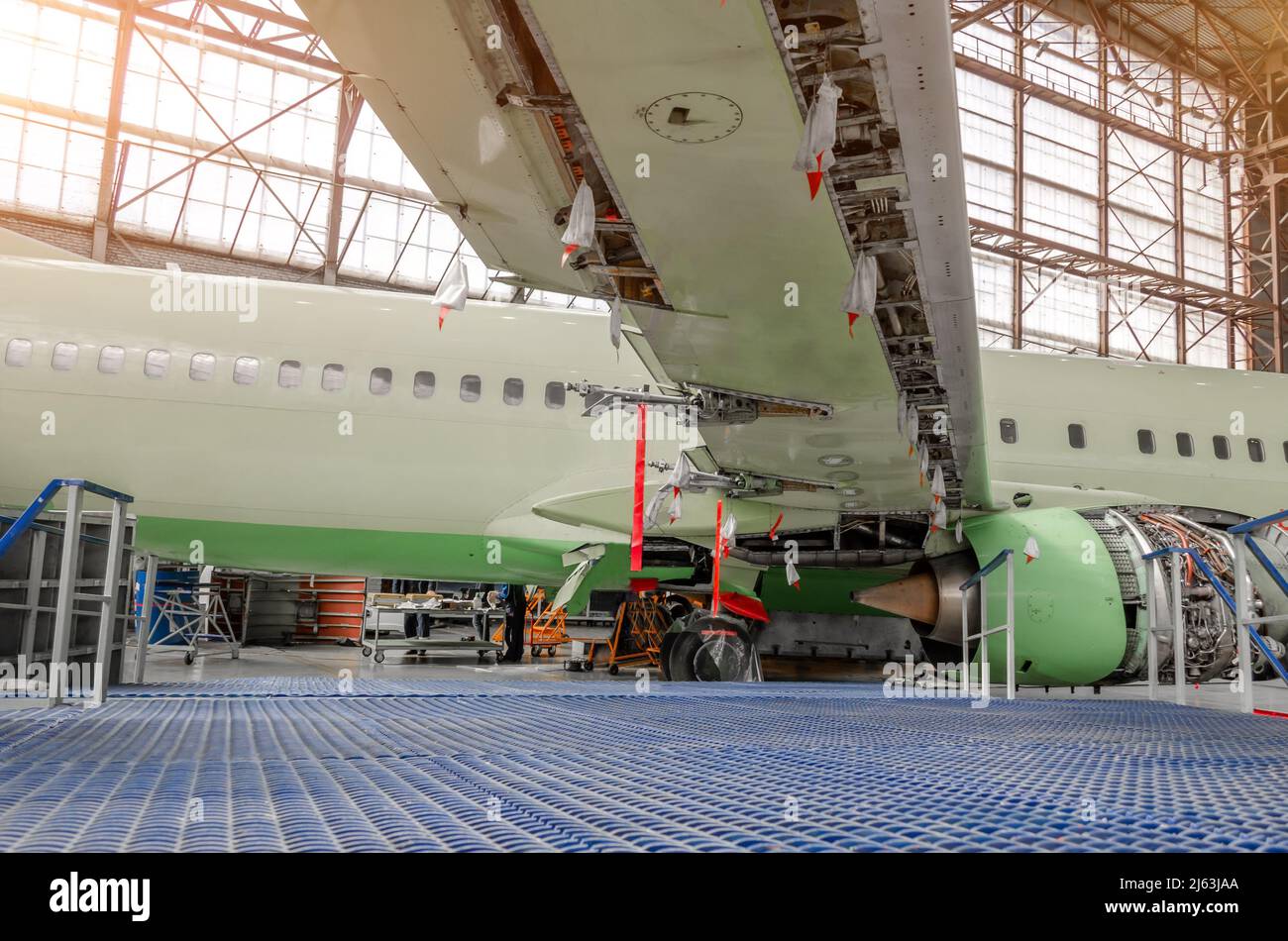 Maintenance and repair of a passenger aircraft wing. Wing flaps ...