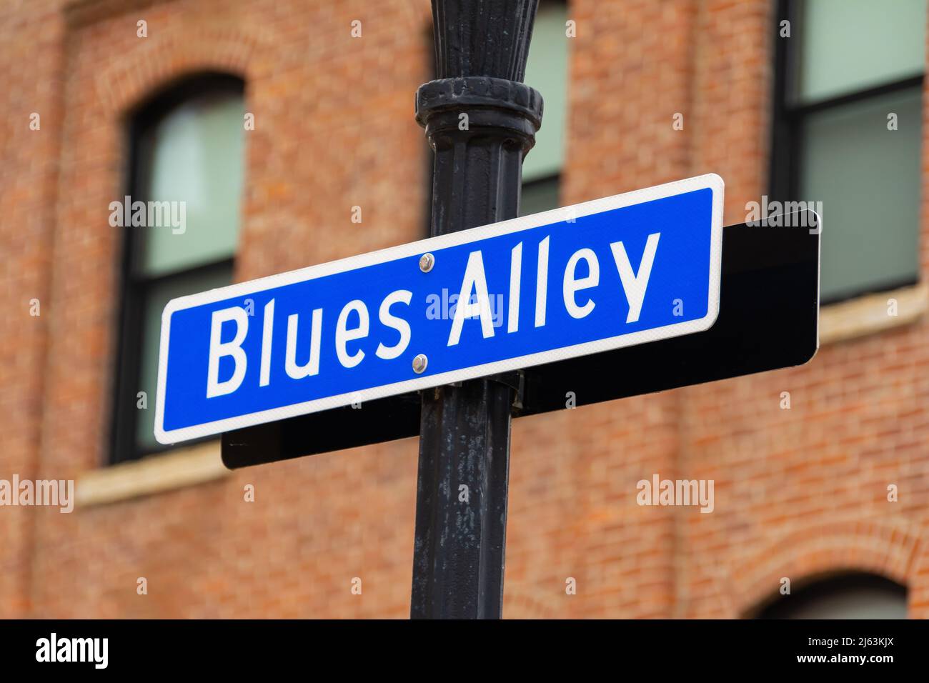 Blues Alley street sign with brick building background. Aurora ...