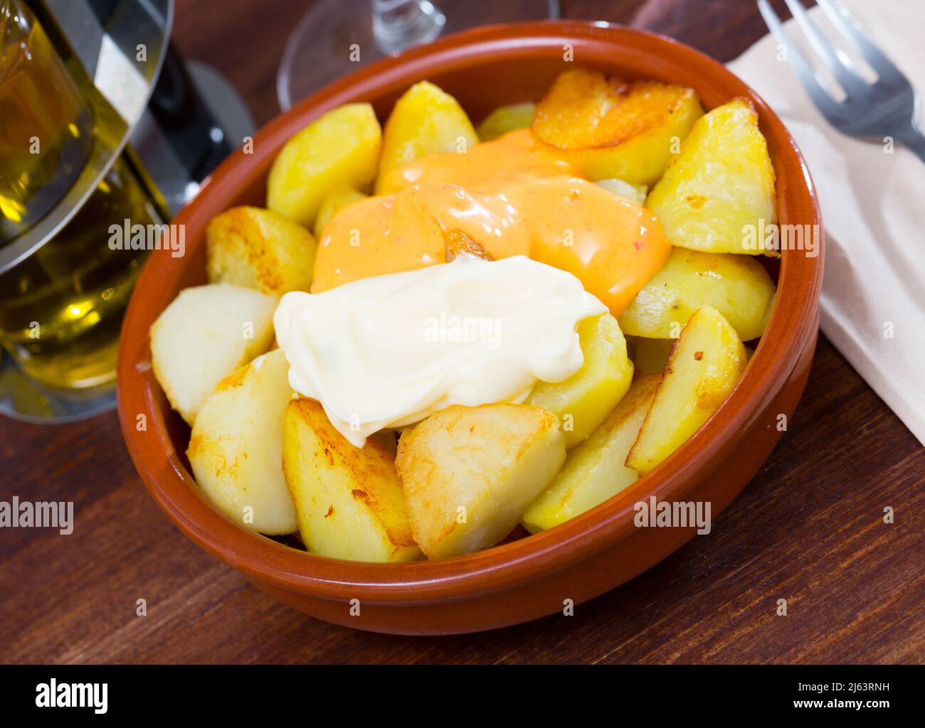 Patatas Bravas - traditional Spanish potato snack Stock Photo - Alamy