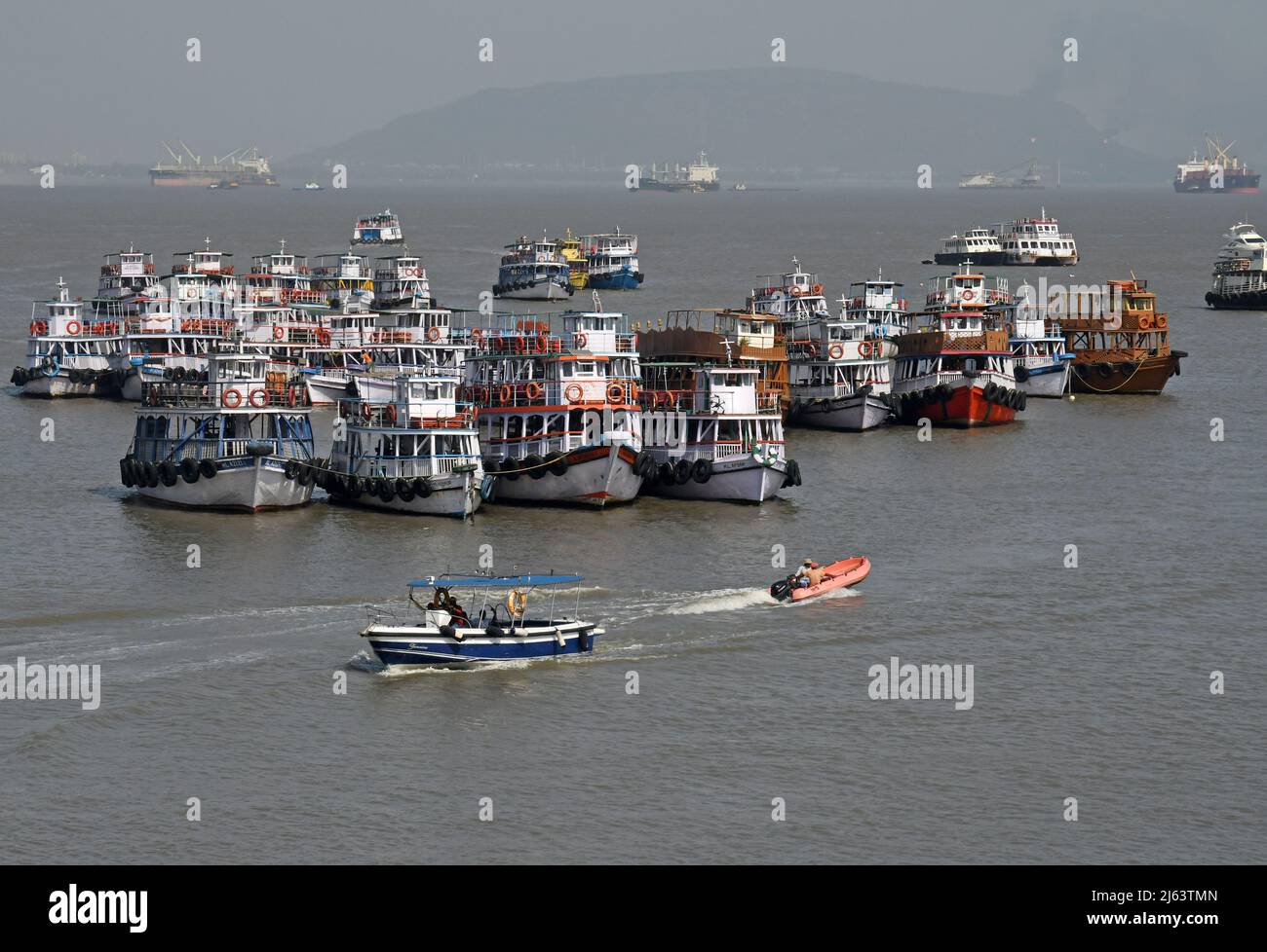 Ferry boats anchored at the Arabian sea near the Gateway of India in Mumbai. Ferry boats and ...