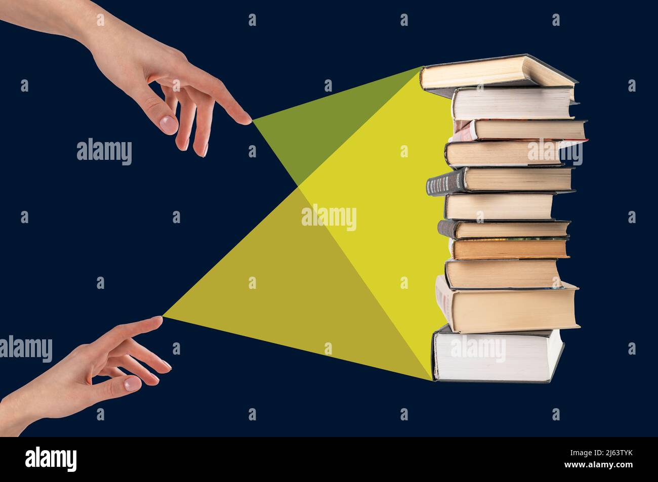 Light ray coming from woman hand to books stack on black background ...