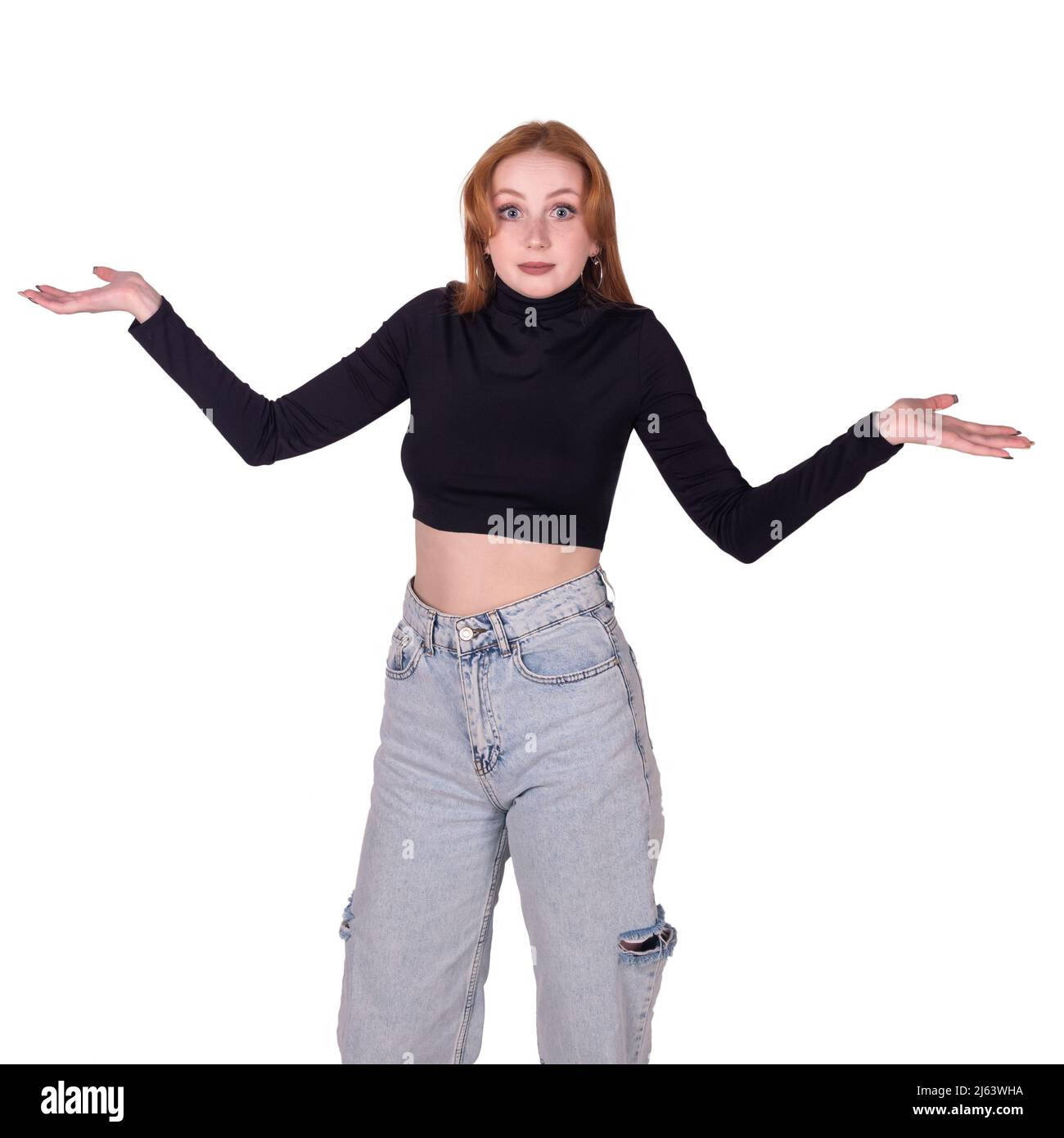 young woman shrugging her shoulders isolated on white background Stock ...