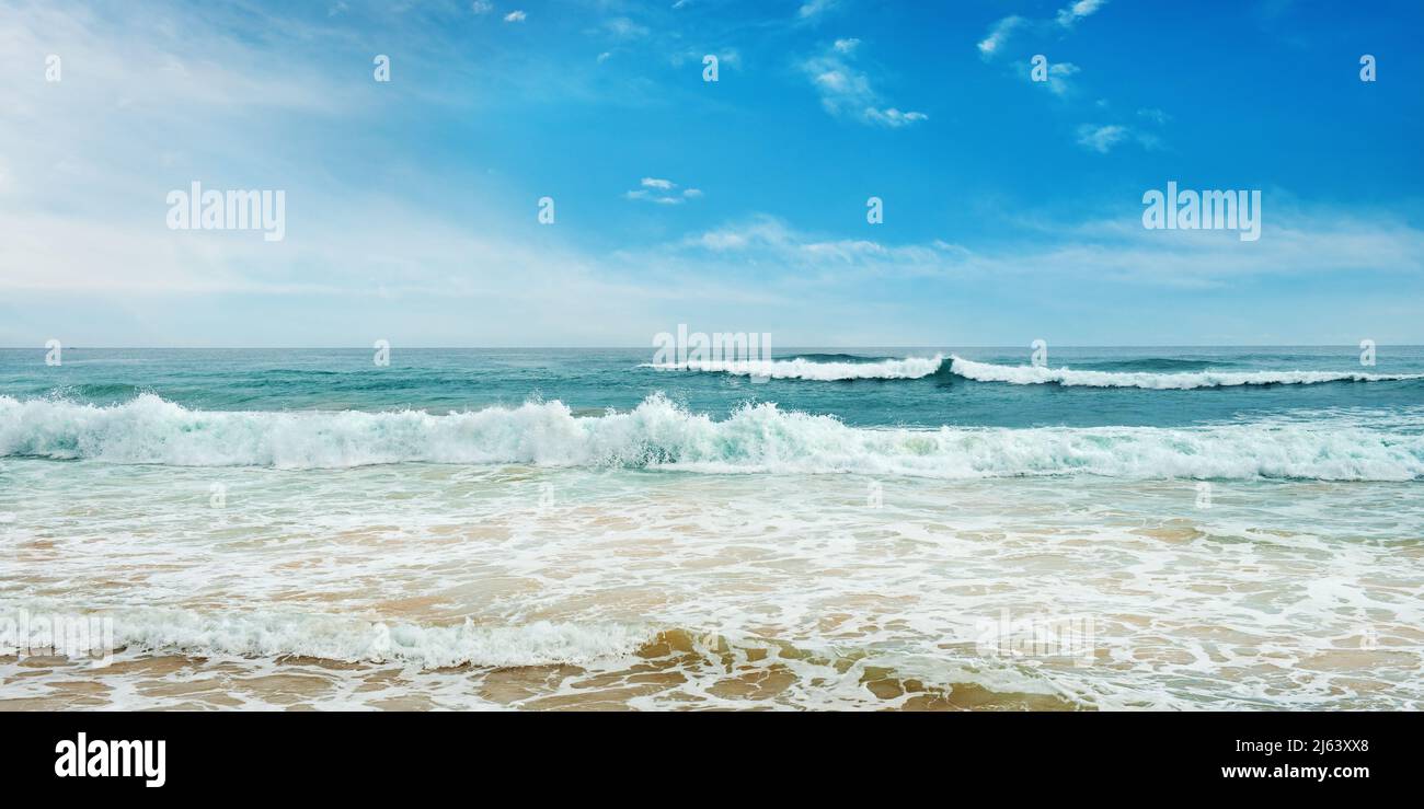 Ocean waves and blue sky Stock Photo - Alamy