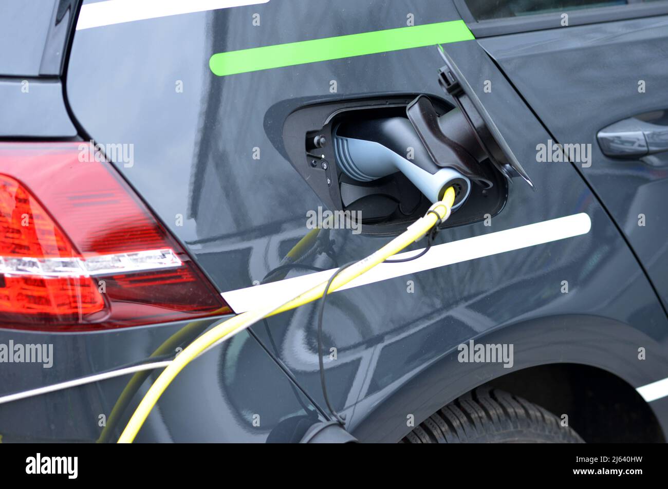 Refuel electric car, EV loading station Stock Photo - Alamy
