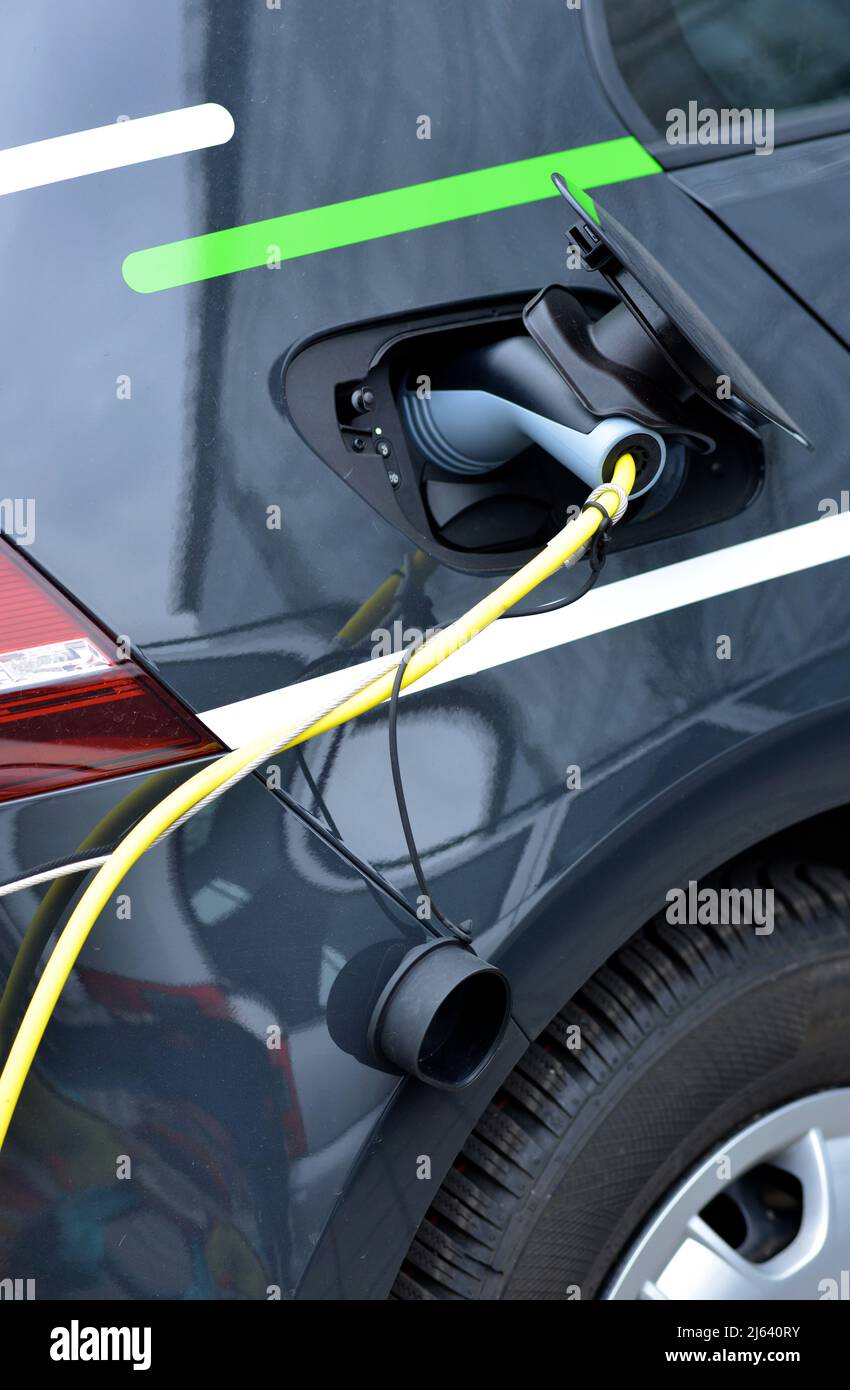 Detail of an e-car on the power line Stock Photo - Alamy