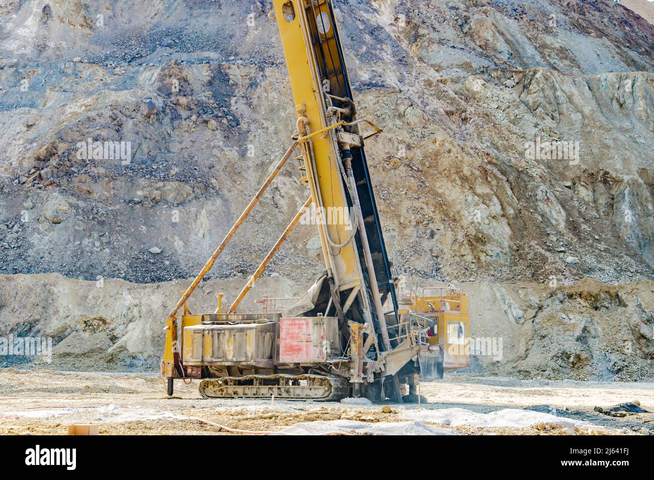 View at drilling rig in open pit mine Stock Photo - Alamy