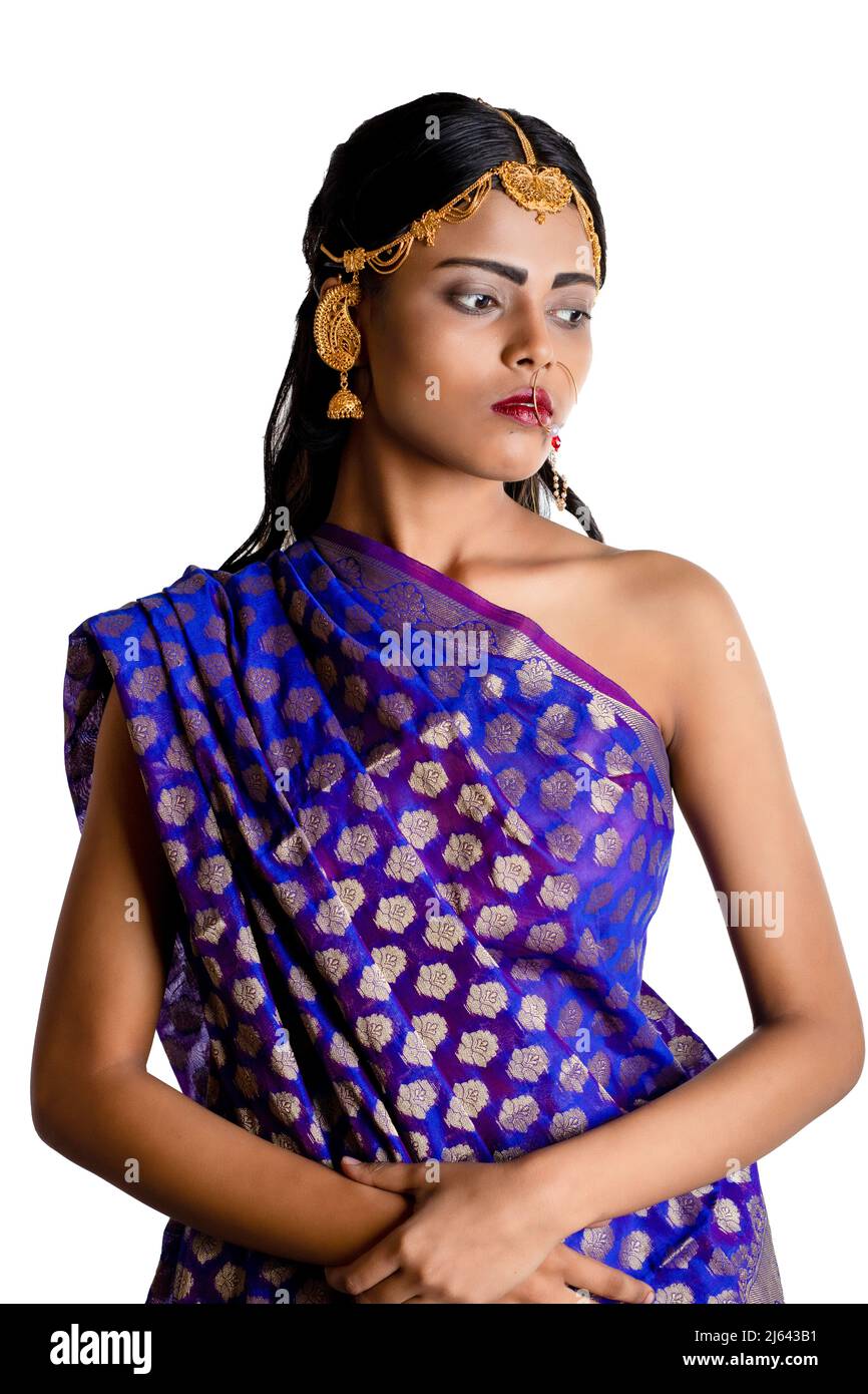 an indian girl wearing a traditional indian blue saree and simple ...