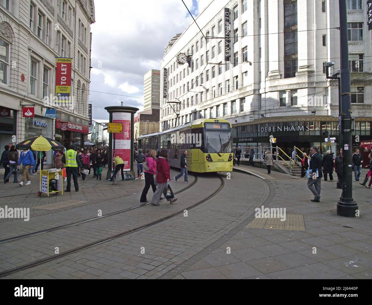 MARKET STREET. MANCHESTER. ENGLAND. 11-04-12. Manchester Metrolink tram ...