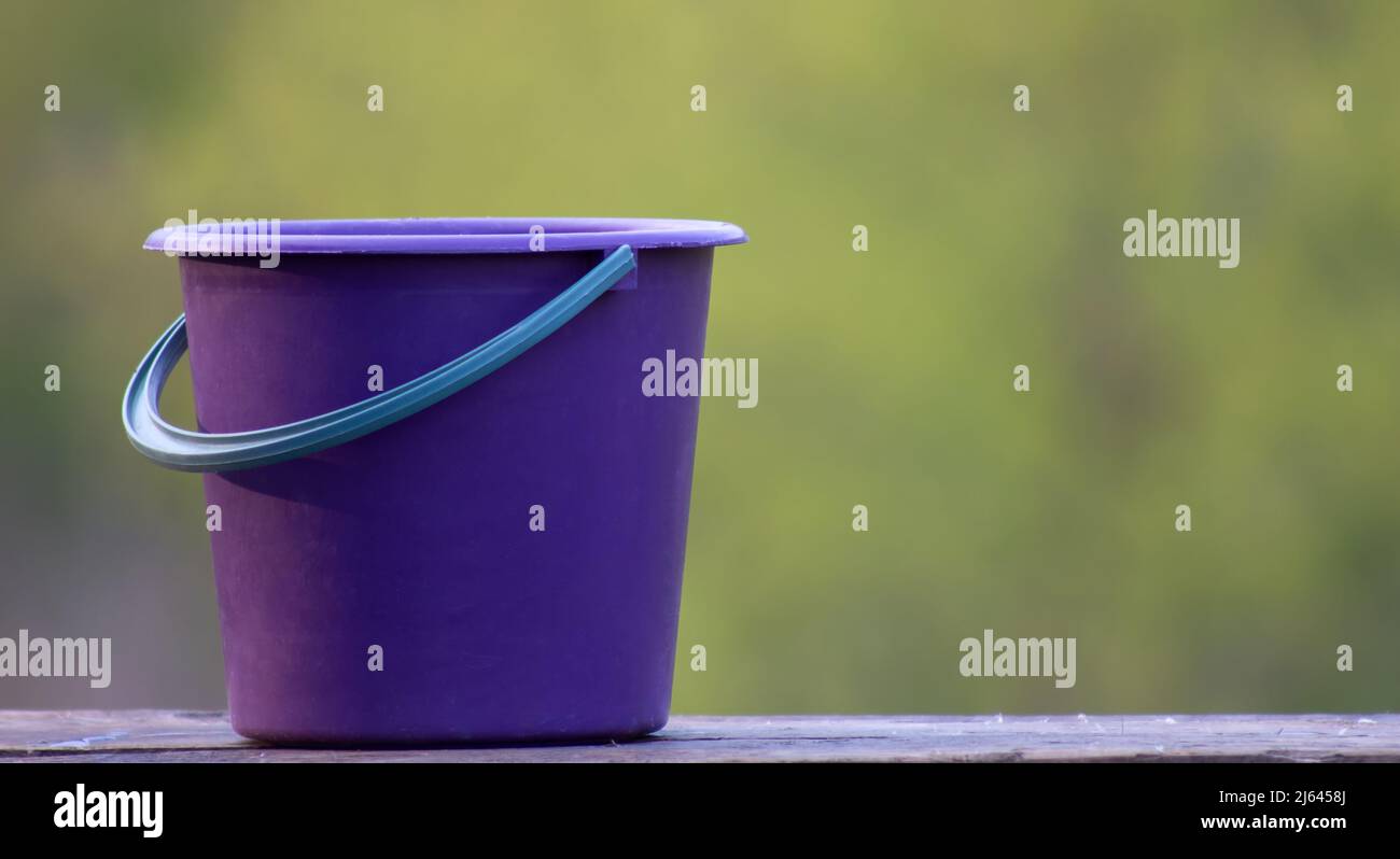 Empty metal bucket wooden hi-res stock photography and images - Alamy